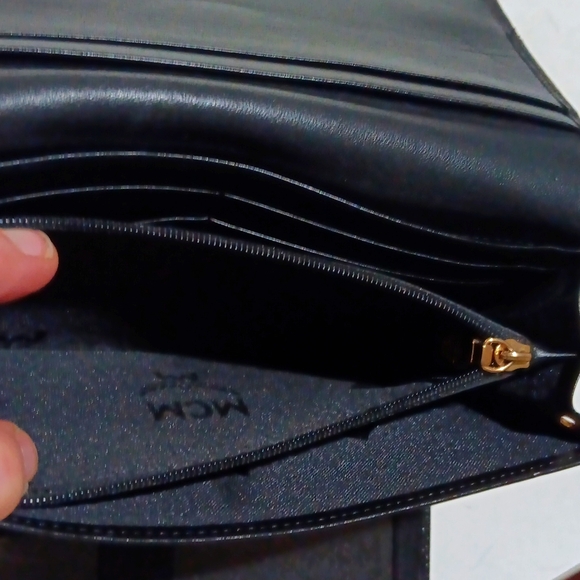 MCM | Bags | Mcm Germany Long Leather Trifold Wallet Signature Embossed ...